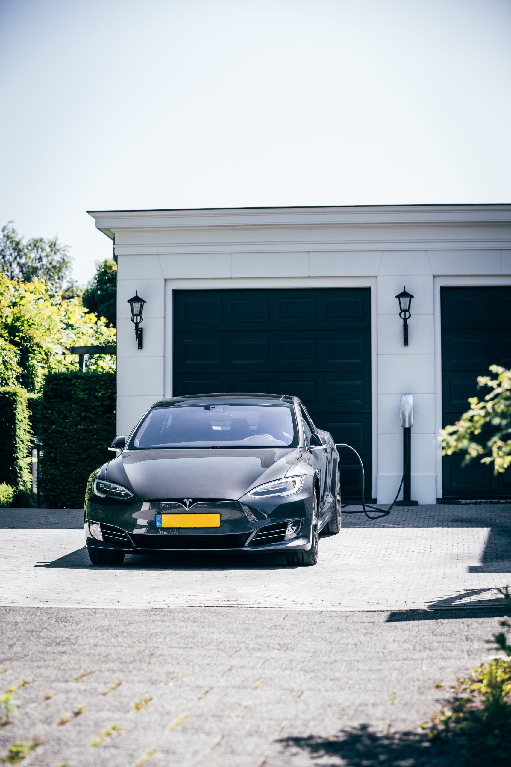 Maxem werkt naadloos samen met je Tesla Wall Connector